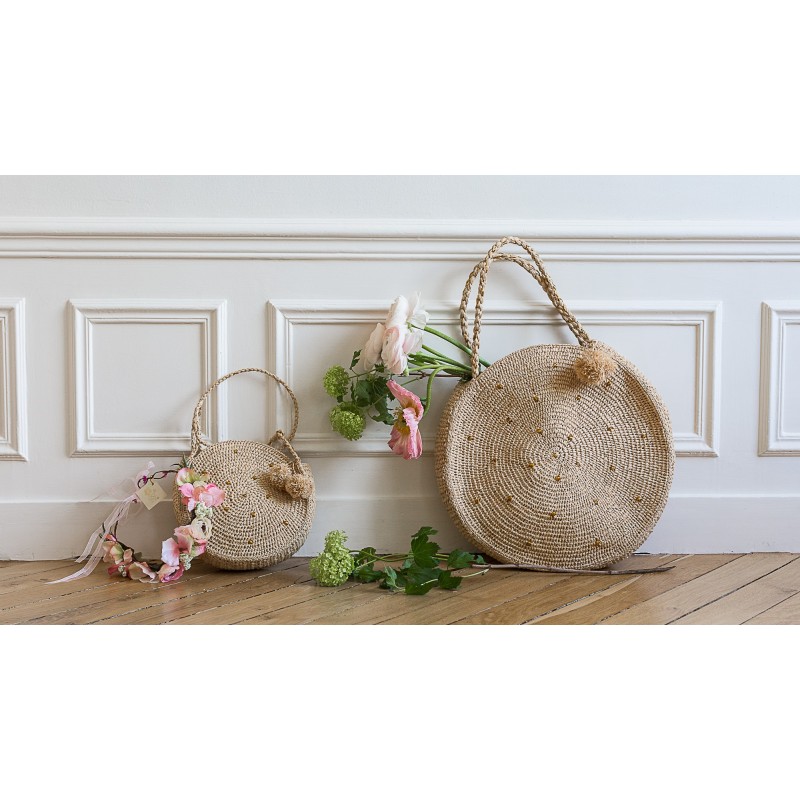 Sac à main rond en raphia naturel confectionné à Madagascar